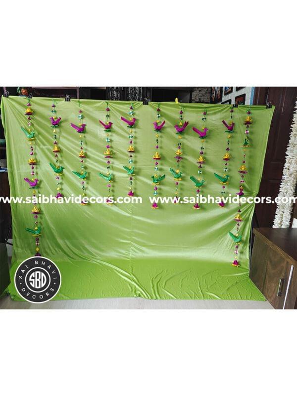 Light Green Backdrop Set With Palm Leaf Strings | Sai Bhavi Decors