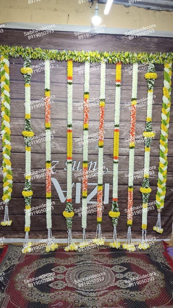 multi colour backdrop strings settt | Sai Bhavi Decors